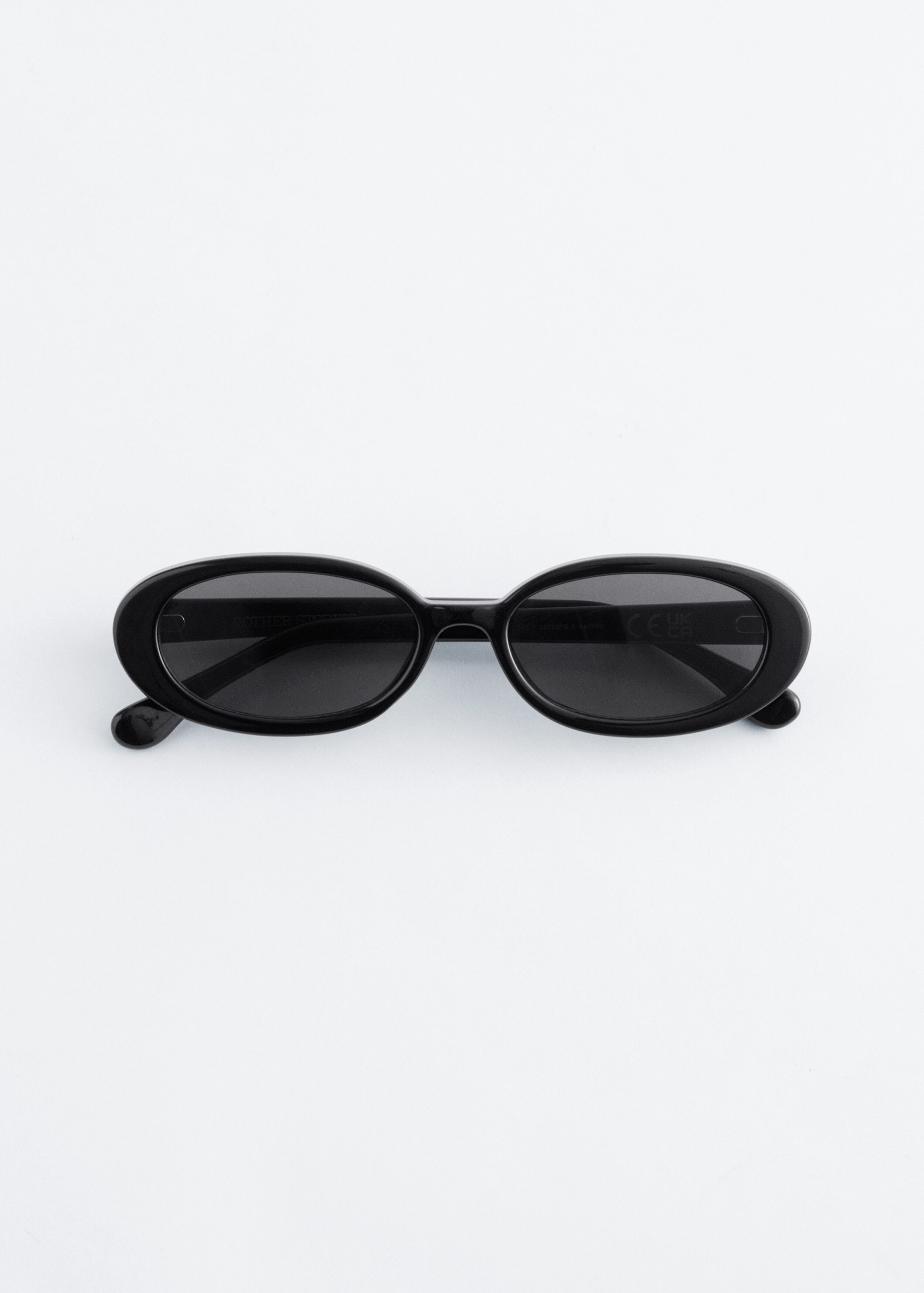 Smala ovala solglasögon – Svart – Accessories – & Other Stories SE